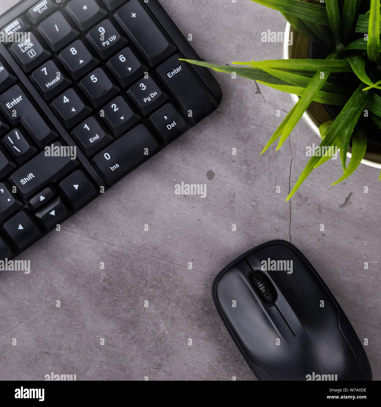 Working place on dark table with copy space. Table with keyboard ...