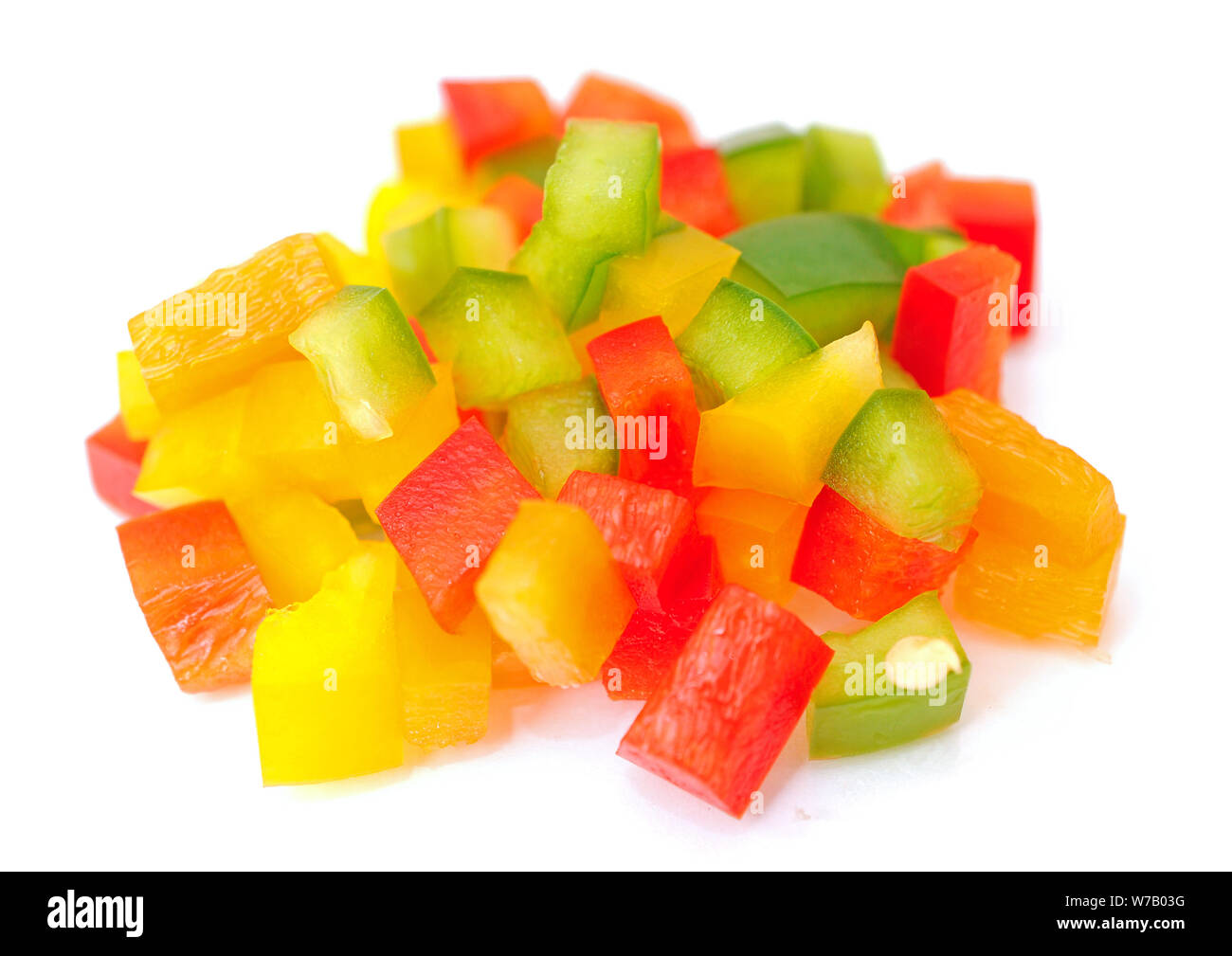 cutting mix colorful bell peppers on white background Stock Photo - Alamy