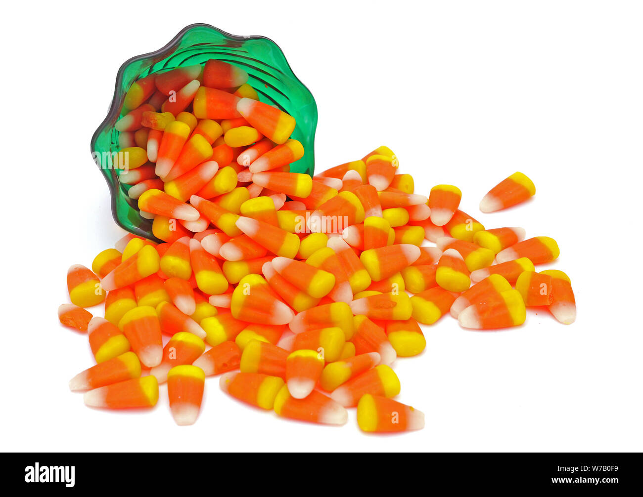 tooth candies on basket on white background Stock Photo - Alamy