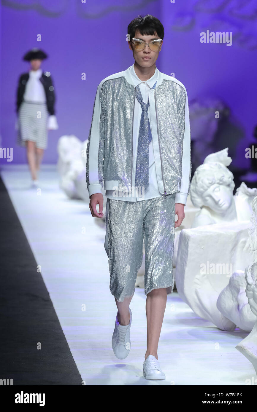A model displays a new creation at the fashion show of JI CHENG during ...