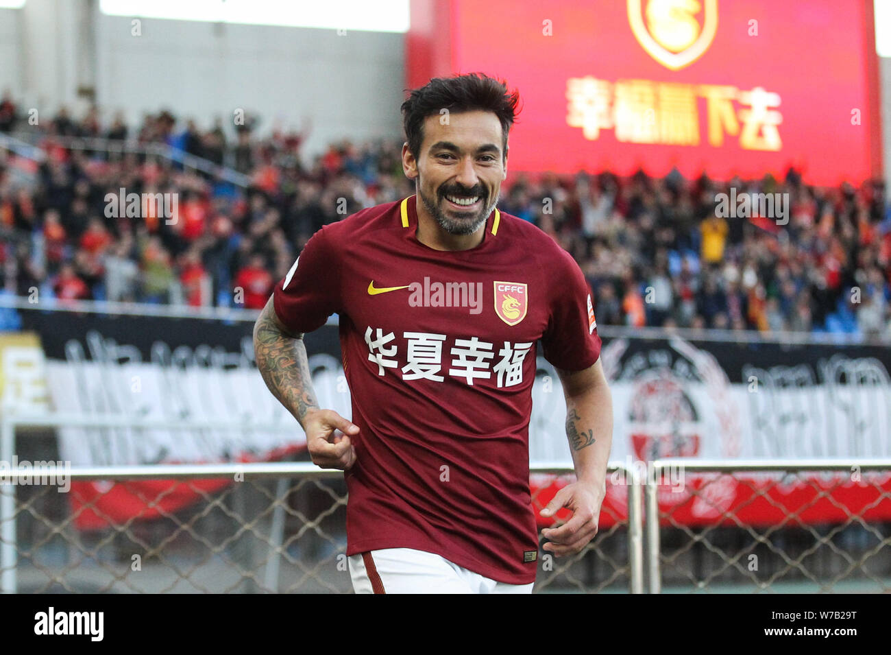 Argentine football player Ezequiel Lavezzi celebrates after scoring a ...