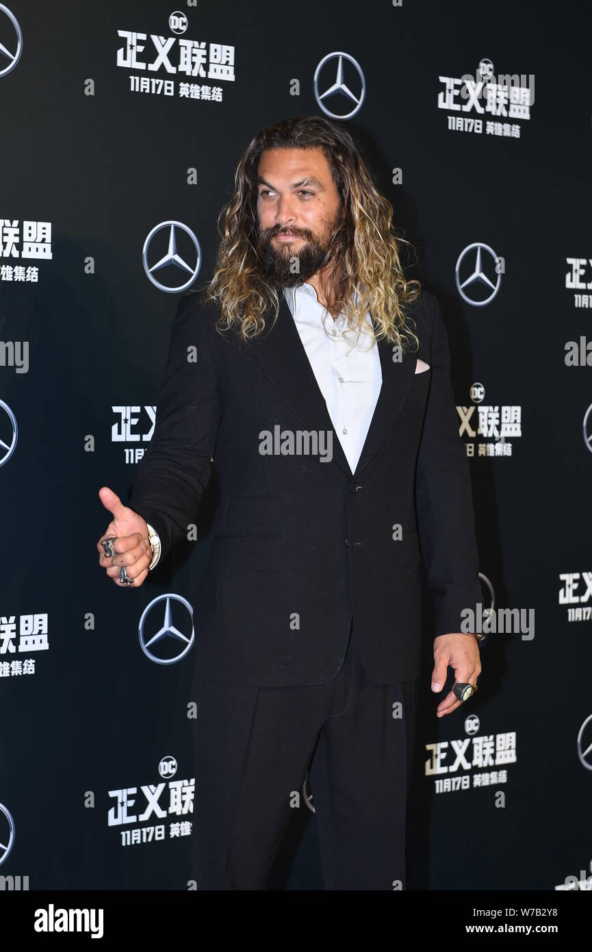 American actor and model Jason Momoa poses as he arrives on the red ...