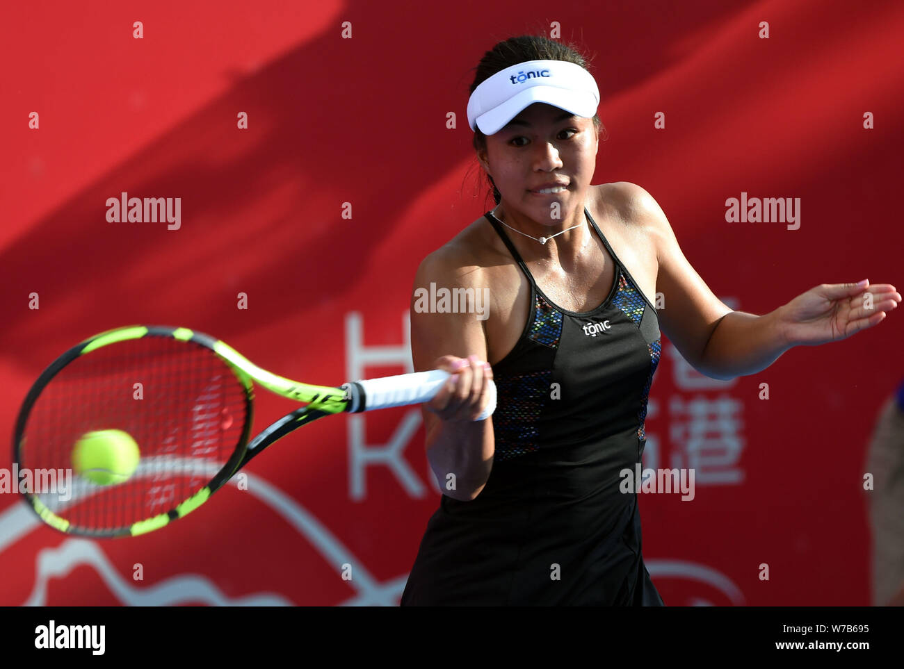 Lizette Cabrera of Australia returns a shot to Daria Gavrilova of ...