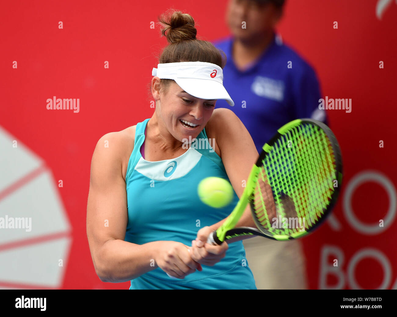Brady Jennifer of the United States returns a shot to Daria Gavrilova ...
