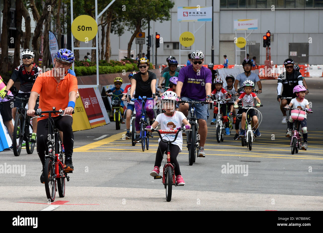 Participants take part in the third Hong Kong Cyclothon, which is ...