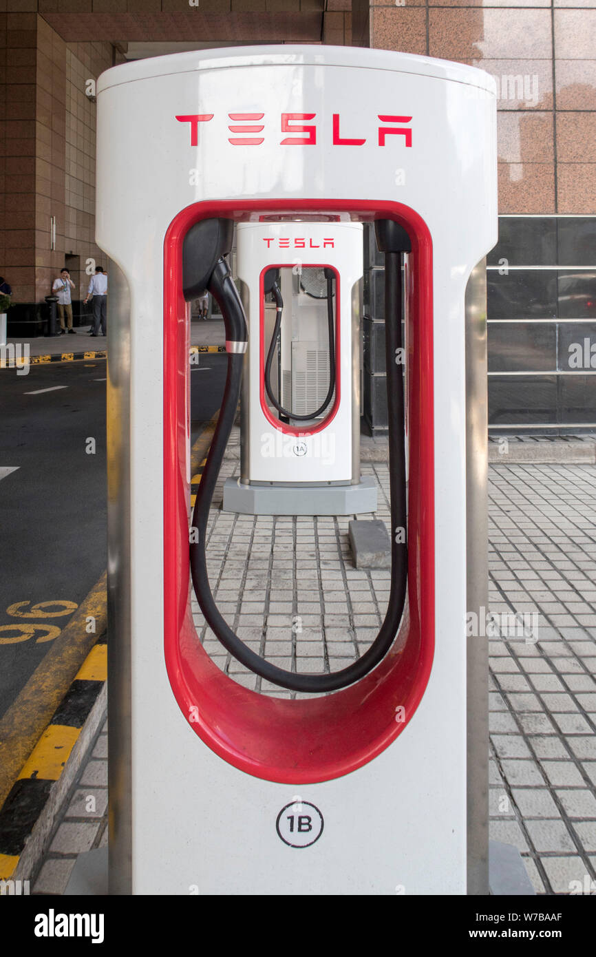 --FILE--Charging piles are seen at a Tesla's super charging station in ...