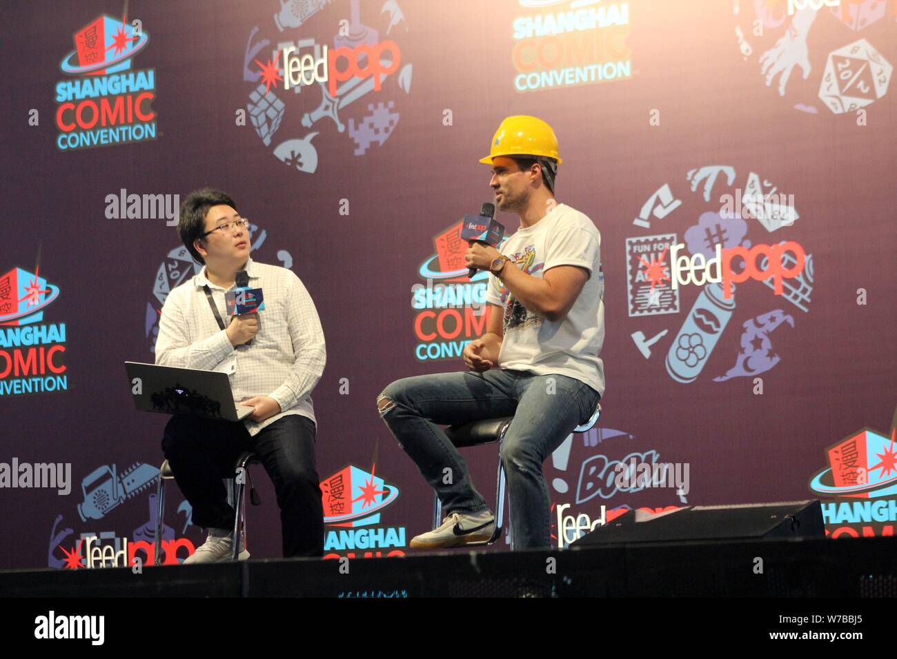 American actor Brett Dalton, right, best known for playing Grant Ward ...