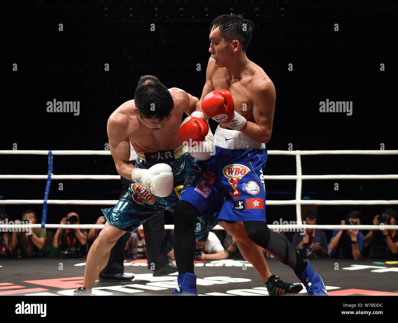 Rex Tso Sing-yu of Hong Kong, right, competes against Kohei Kono of ...