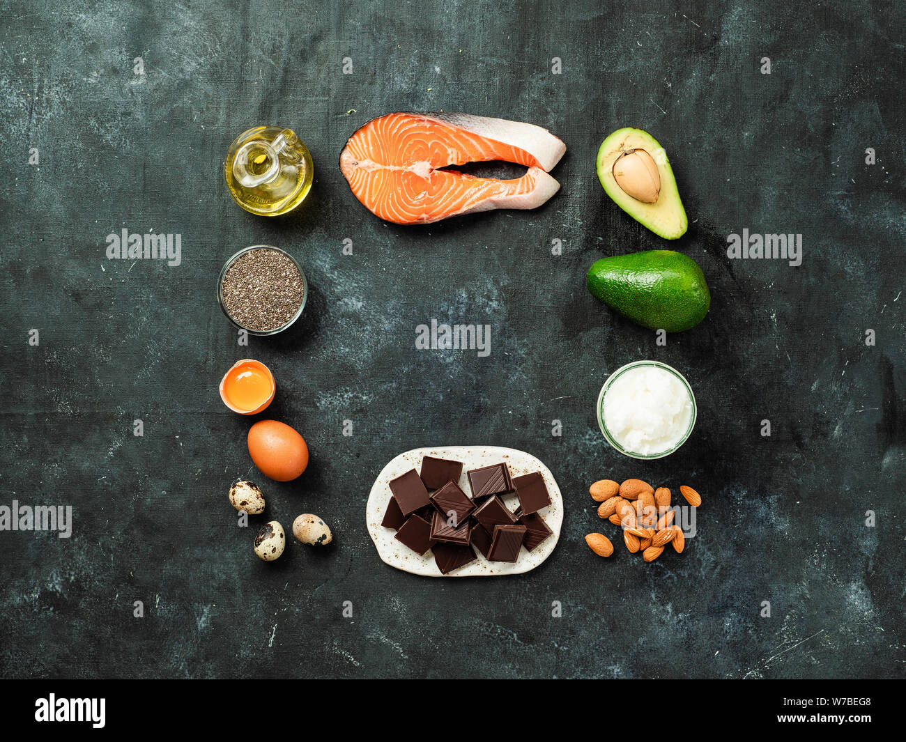 Healthy fats sources concept. Different food ingredients rich good ...