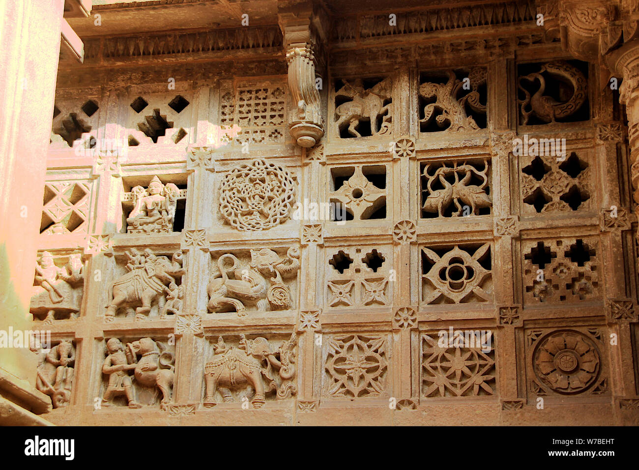 Highly decorative and skillfully carved stone window frame at Jain ...