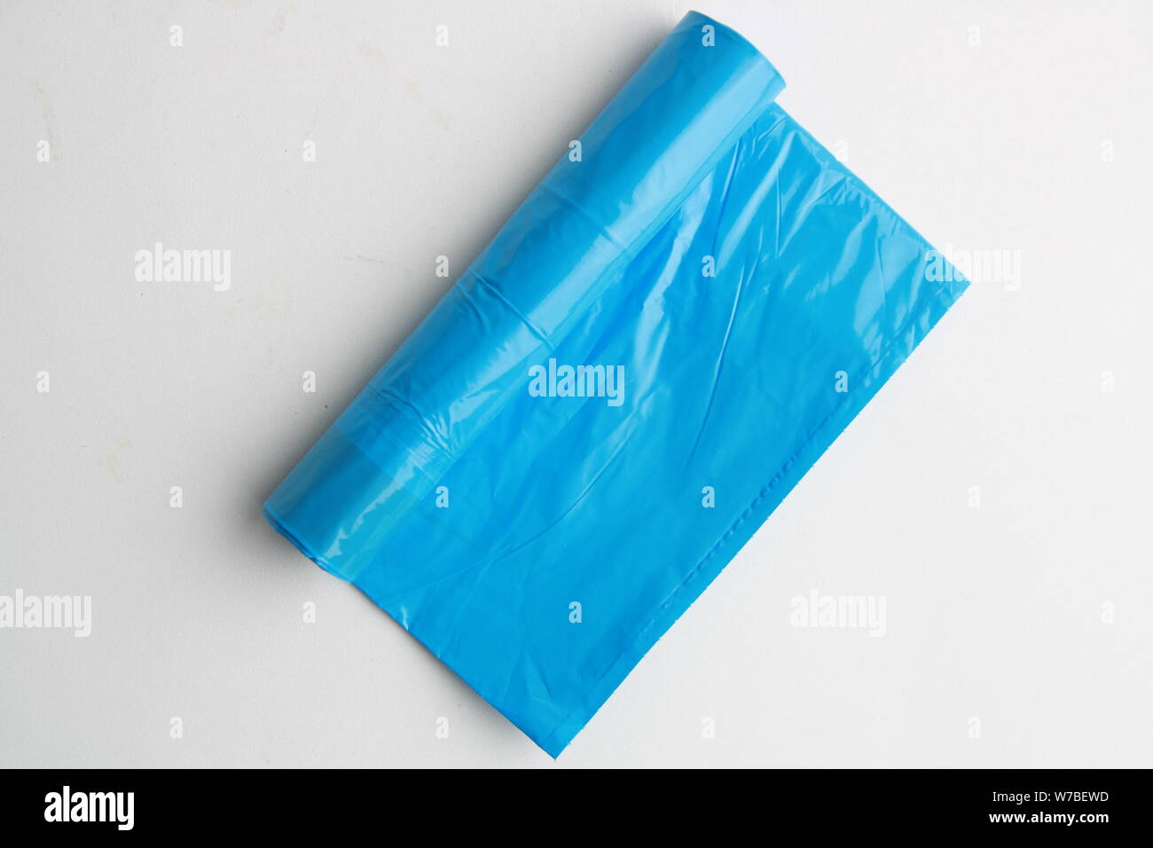 roll of blue garbage bags Stock Photo - Alamy
