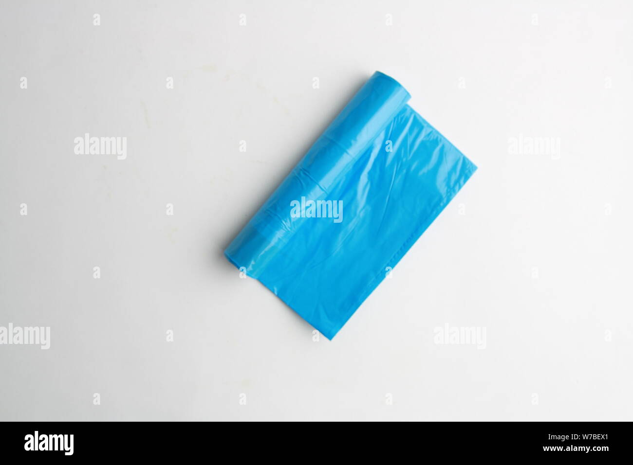 roll of blue garbage bags Stock Photo - Alamy