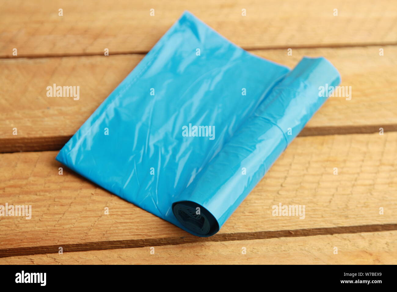 roll of blue garbage bags Stock Photo - Alamy