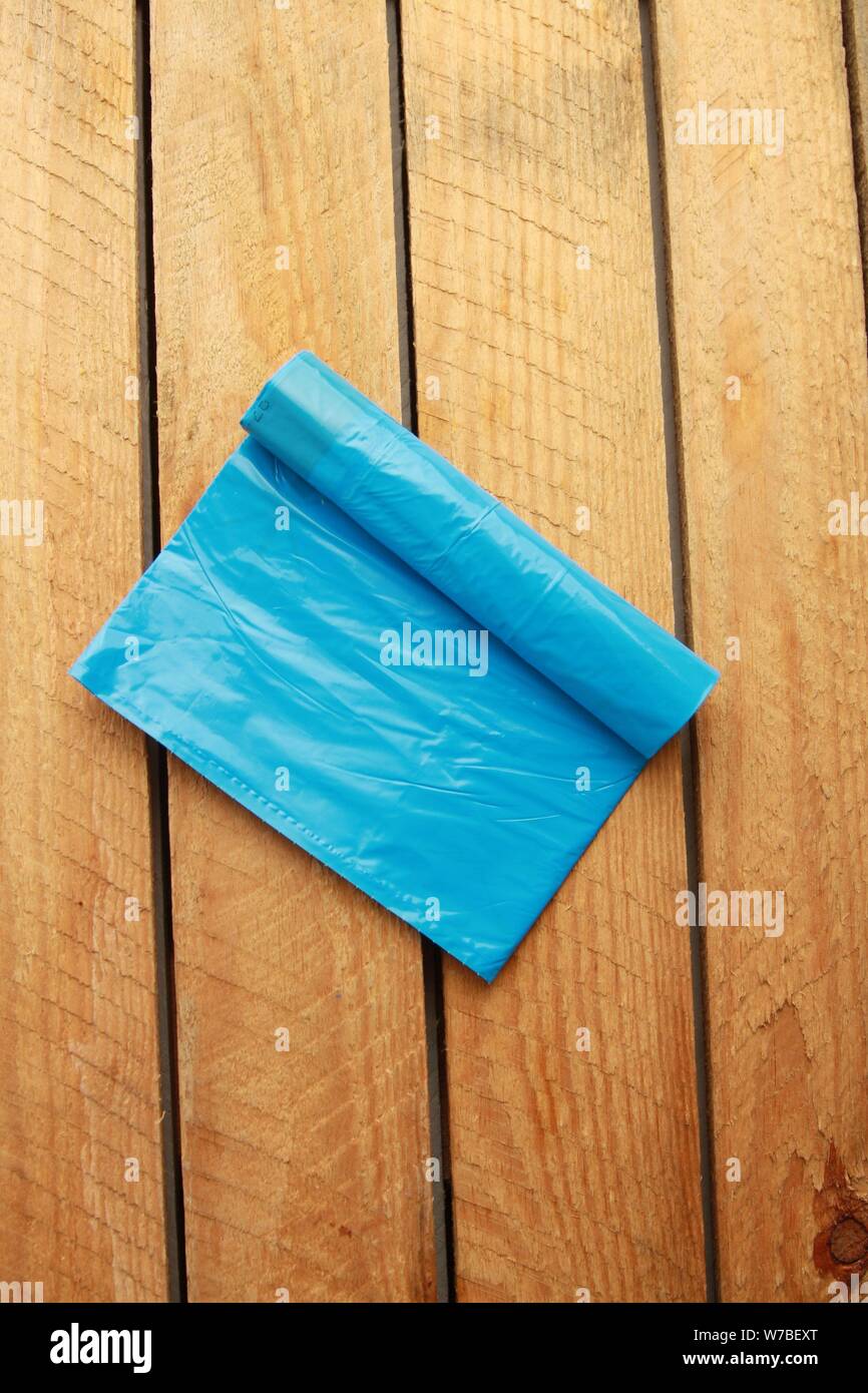 roll of blue garbage bags Stock Photo - Alamy