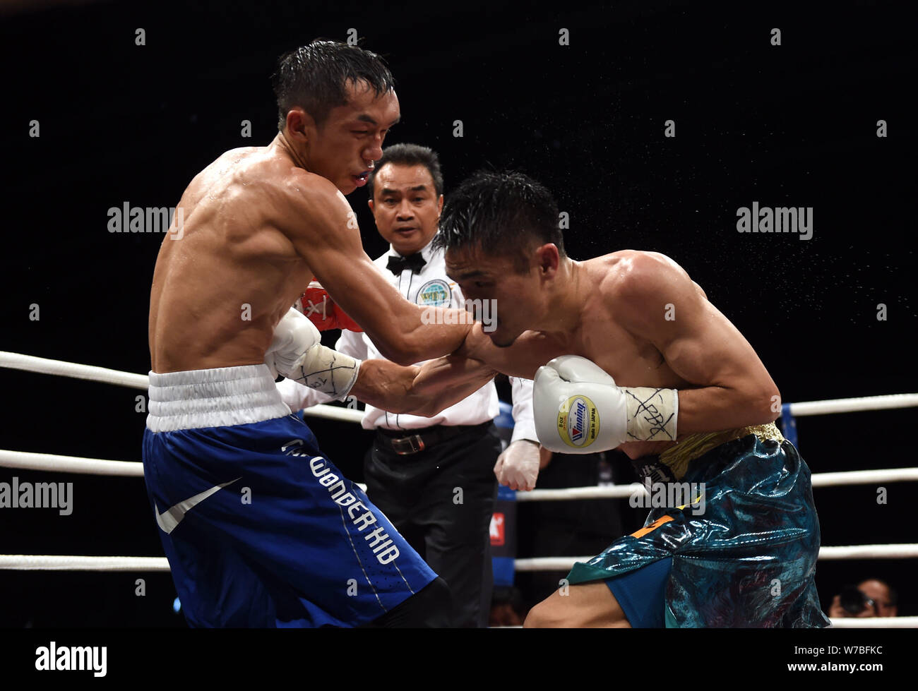 Rex Tso Sing-yu of Hong Kong, left, competes against Kohei Kono of ...