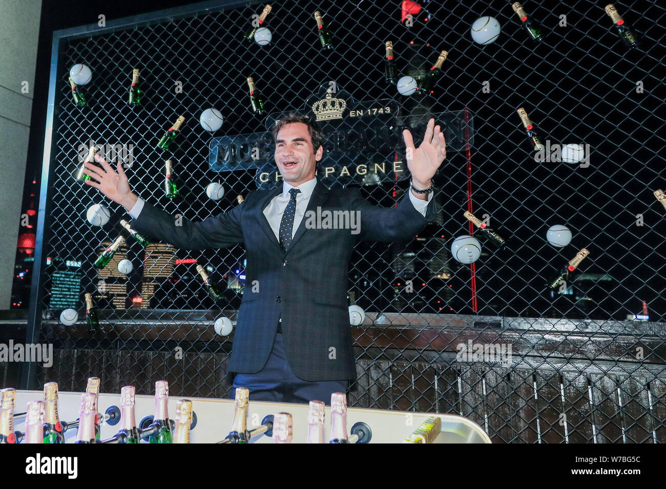 Swiss tennis player Roger Federer poses at the Moet and Chandon Party ...
