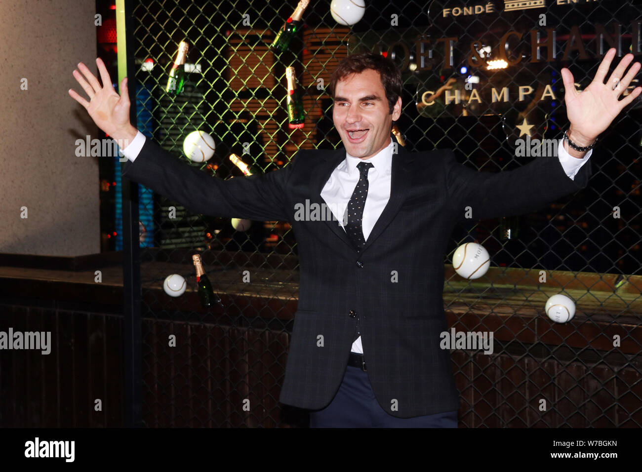 Swiss tennis player Roger Federer poses at the Moet and Chandon Party ...