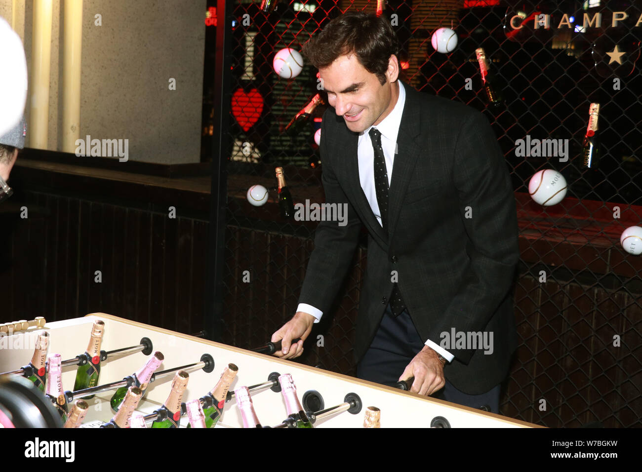 Swiss tennis player Roger Federer poses at the Moet and Chandon Party ...