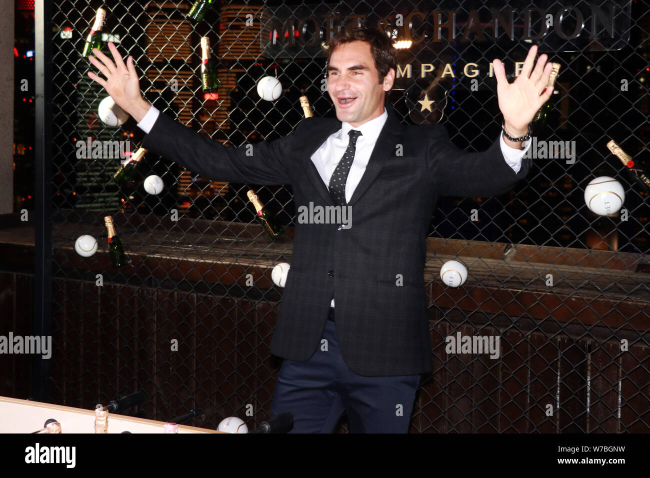 Swiss tennis player Roger Federer poses at the Moet and Chandon Party ...