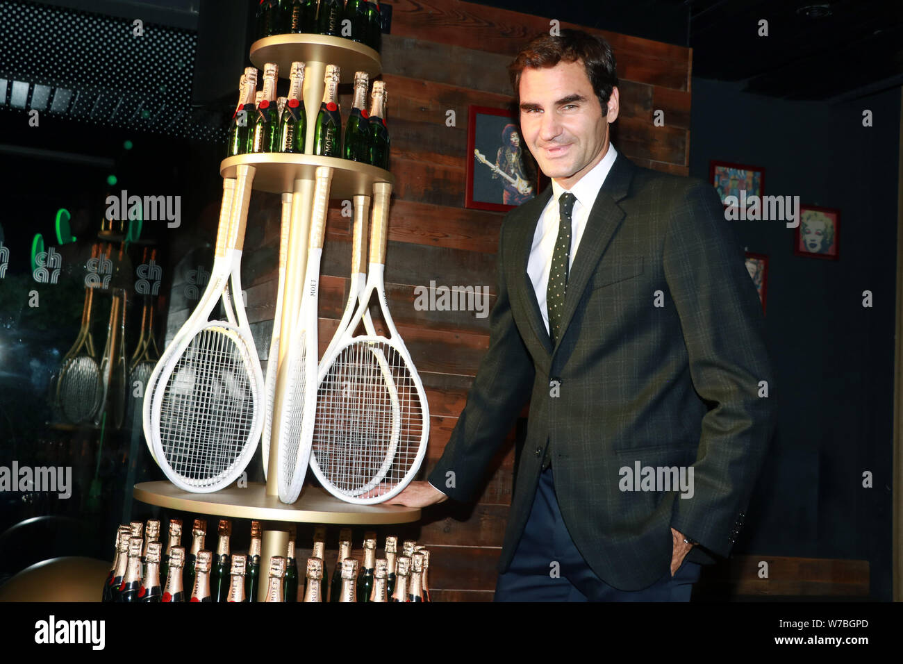 Swiss tennis player Roger Federer poses at the Moet and Chandon Party ...