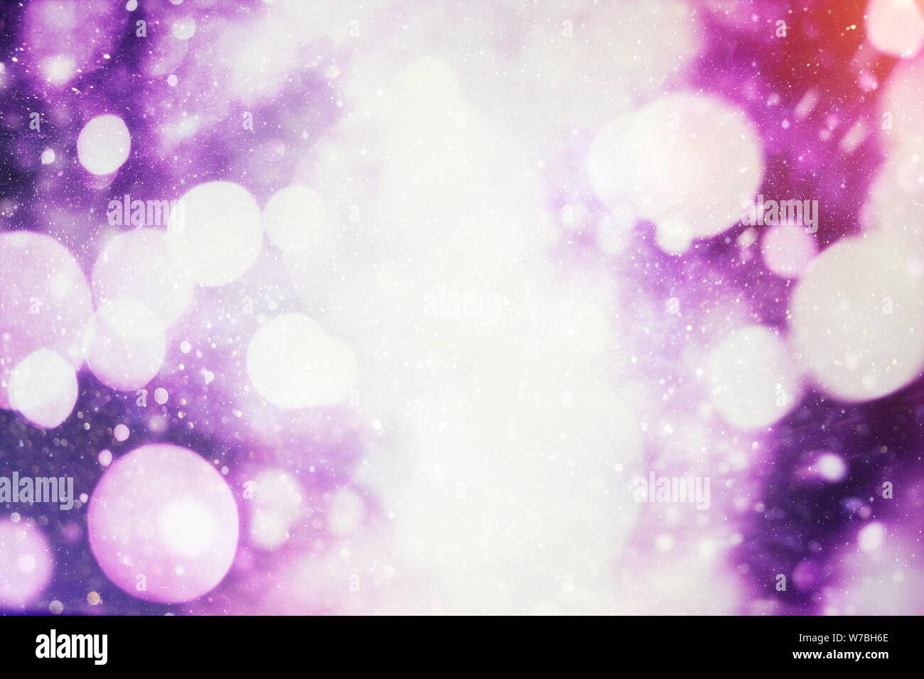 Abstract Festive background. Glitter vintage lights background with ...