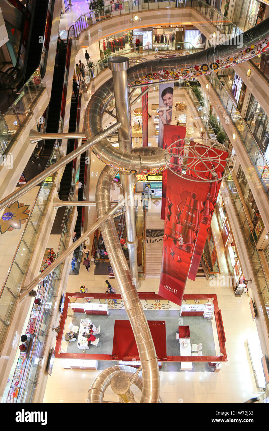View of a huge slide with four curves at a shopping mall in Shanghai ...