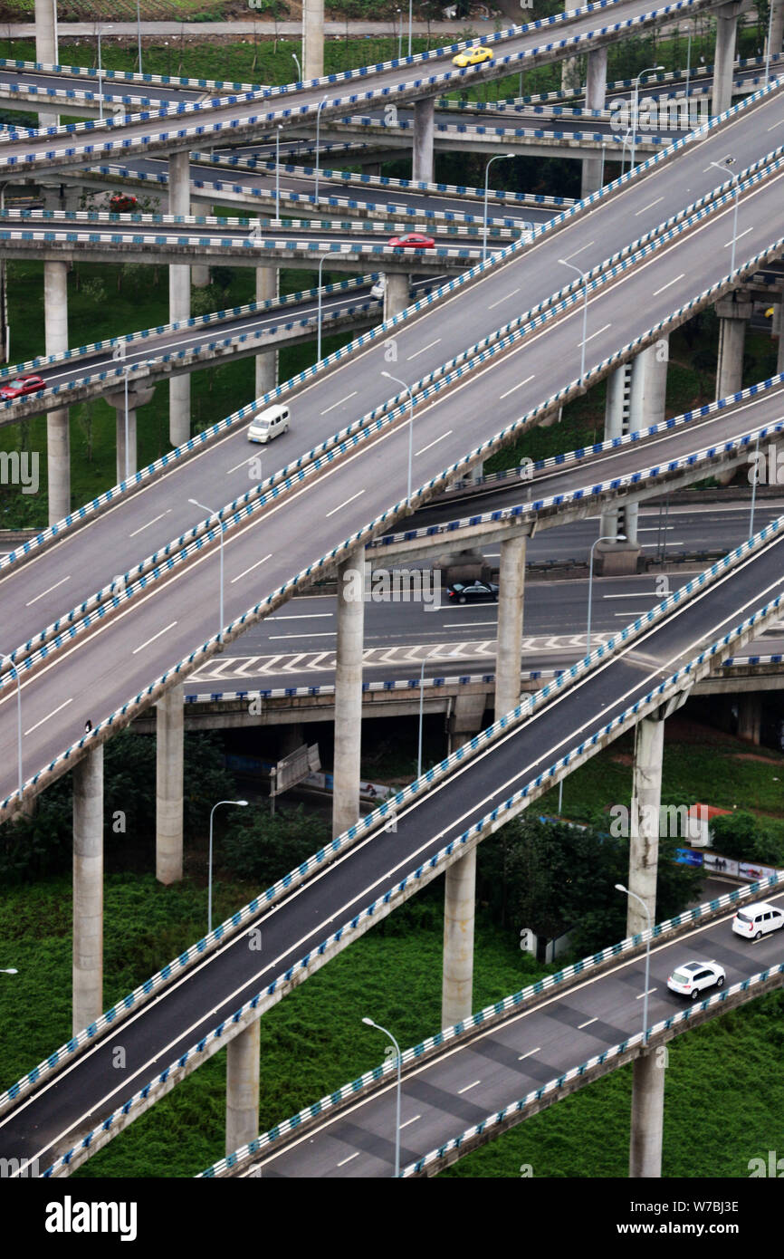 Cars drive on the five-level Huangjuewan Overpass, the world's "most ...
