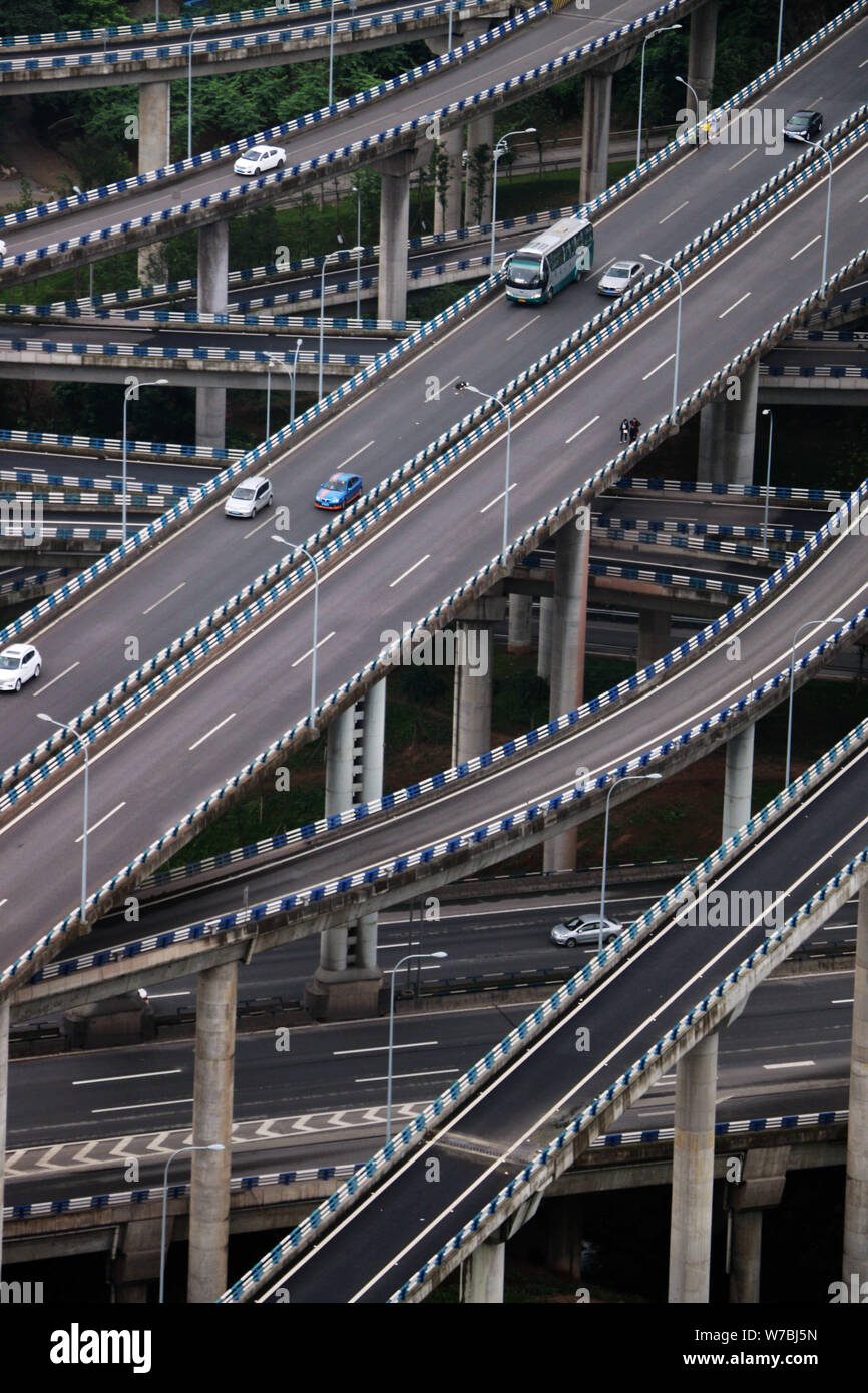Cars drive on the five-level Huangjuewan Overpass, the world's "most ...