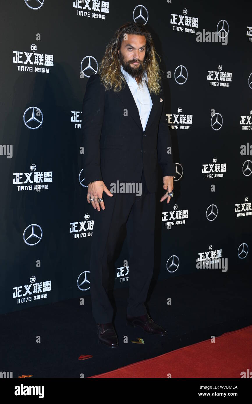 American actor and model Jason Momoa poses as he arrives on the red ...