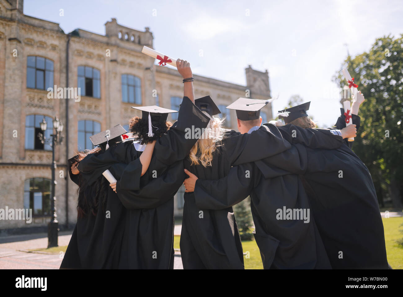 Group of graduates saying goodbye to their university Stock Photo - Alamy