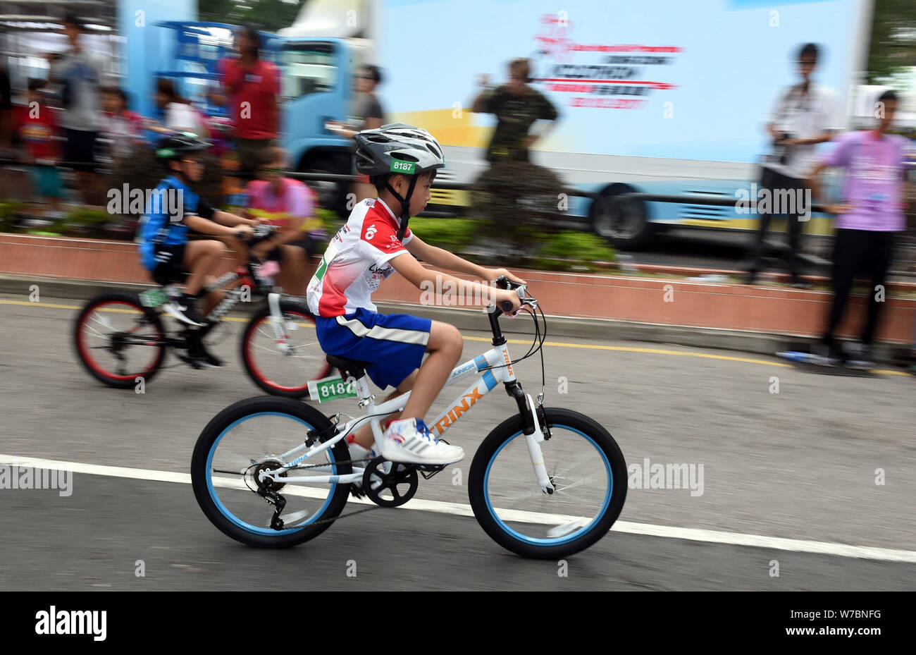 Participants take part in the third Hong Kong Cyclothon, which is ...