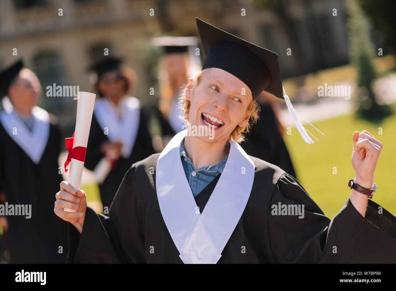 Graduating boy hi-res stock photography and images - Alamy