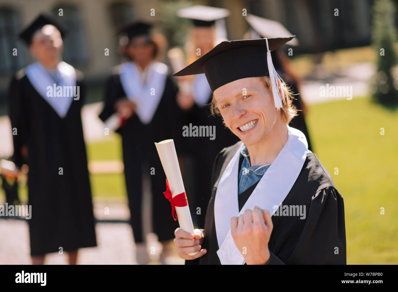 Receiving diploma hi-res stock photography and images - Alamy