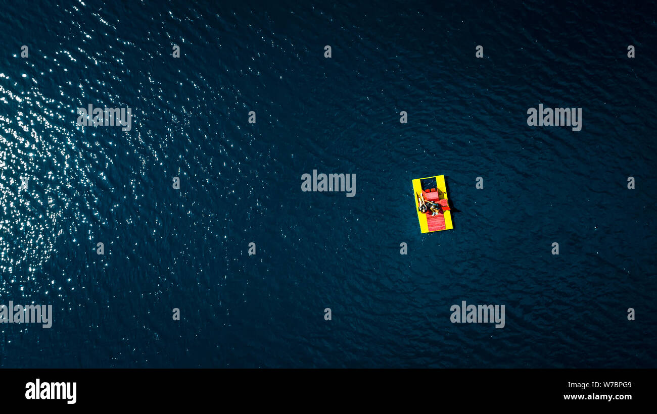 catamaran with people on the water top view Stock Photo - Alamy