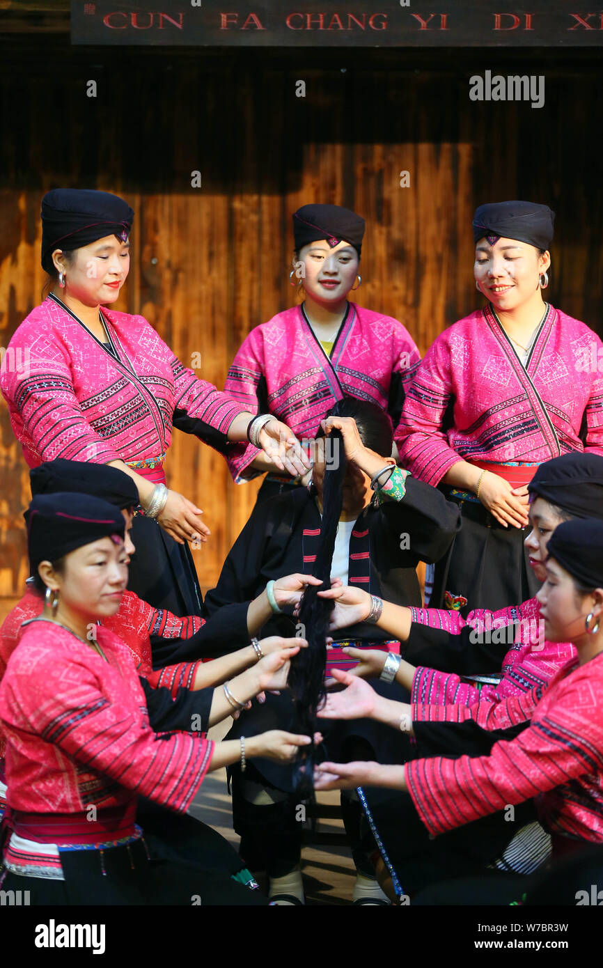 --FILE--A Chinese woman of Red Yao Ethnic Group dressed in traditional ...