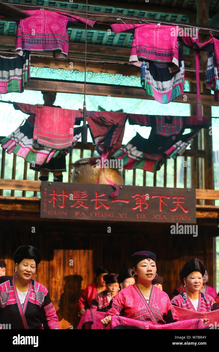 --FILE--Chinese women of Red Yao Ethnic Group dressed in traditional ...