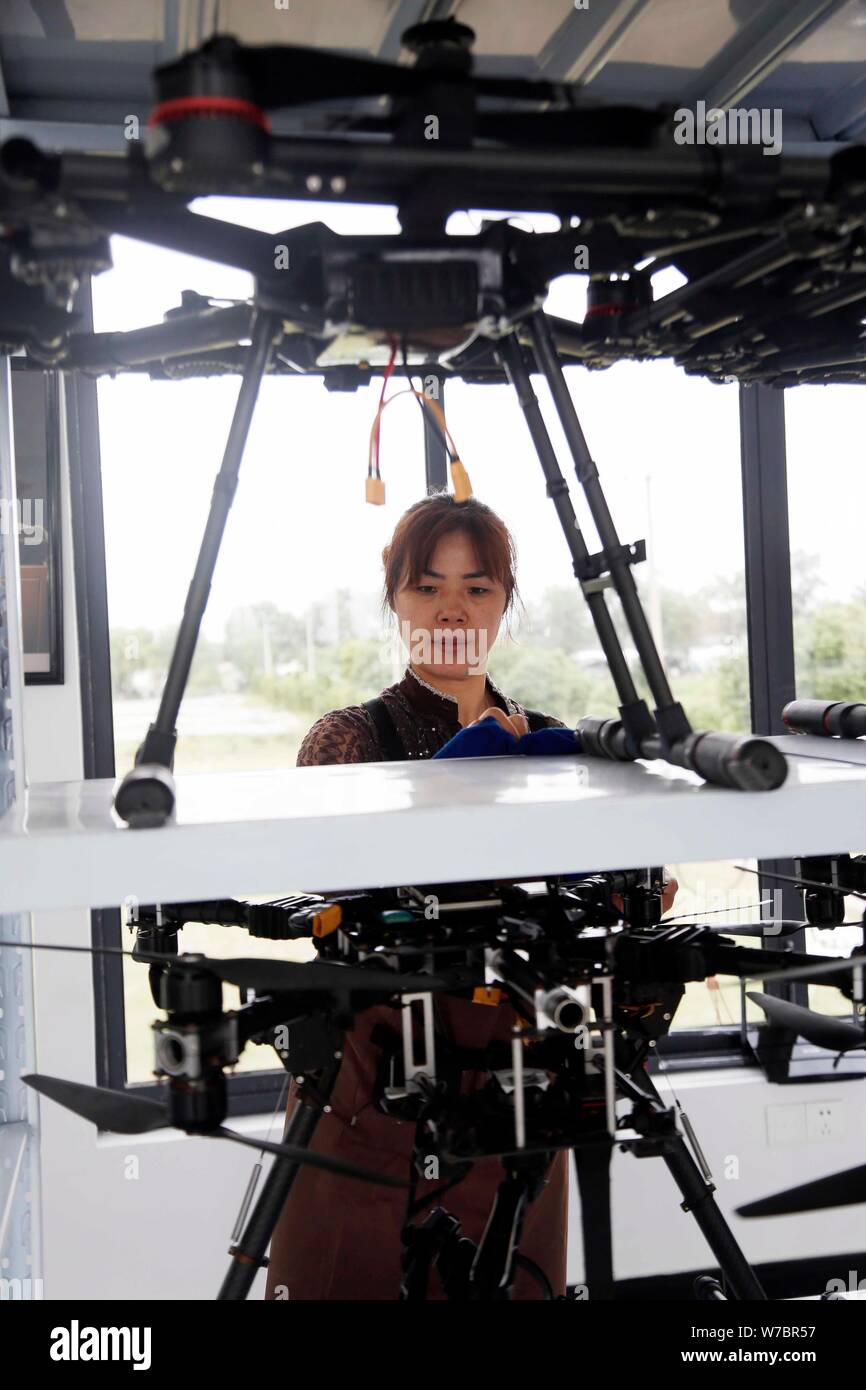 Drones, or UAVs (unmanned aerial vehicles), are on display at the China ...