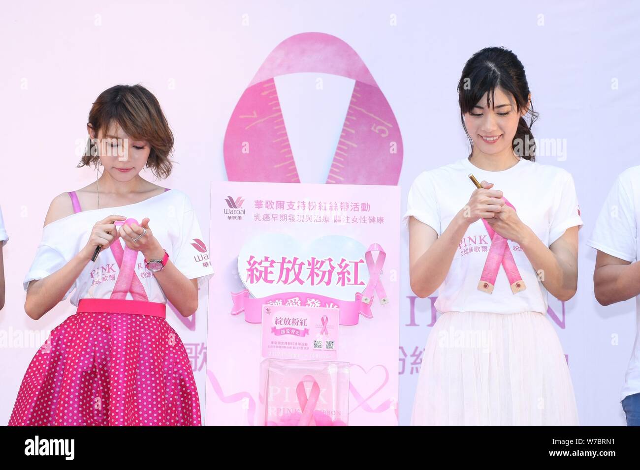 Japanese actress Youki Kato, right, and Malaysian singer and model Lin ... Japanese actress Youki Kato, right, and Malaysian singer and model Lin ...