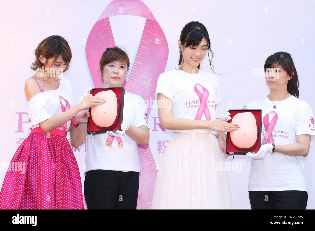 Japanese actress Youki Kato, second right, and Malaysian singer and model Lin Min-Chen, left ...