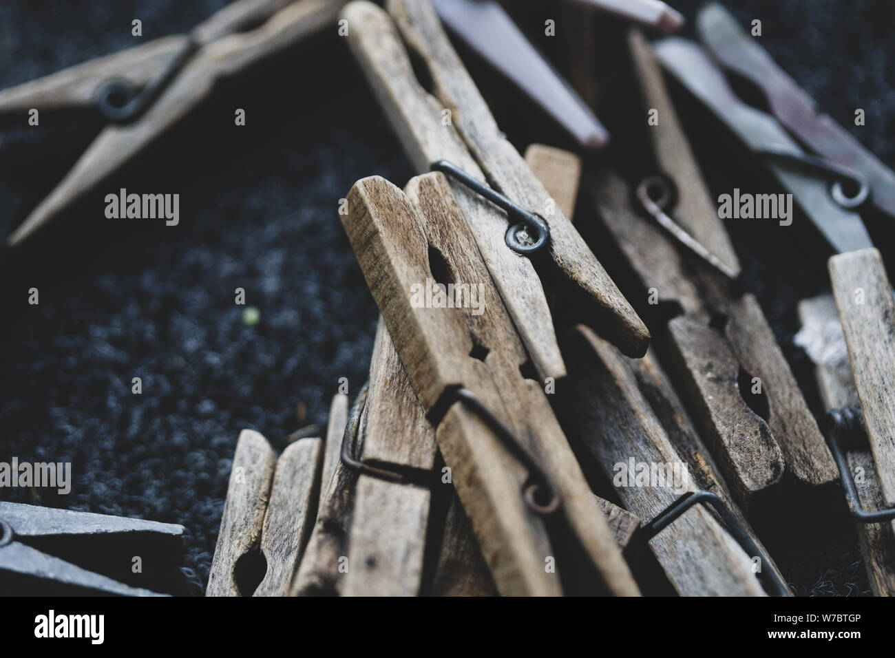 Details with a stack of plastic and wooden clothes pegs Stock Photo - Alamy
