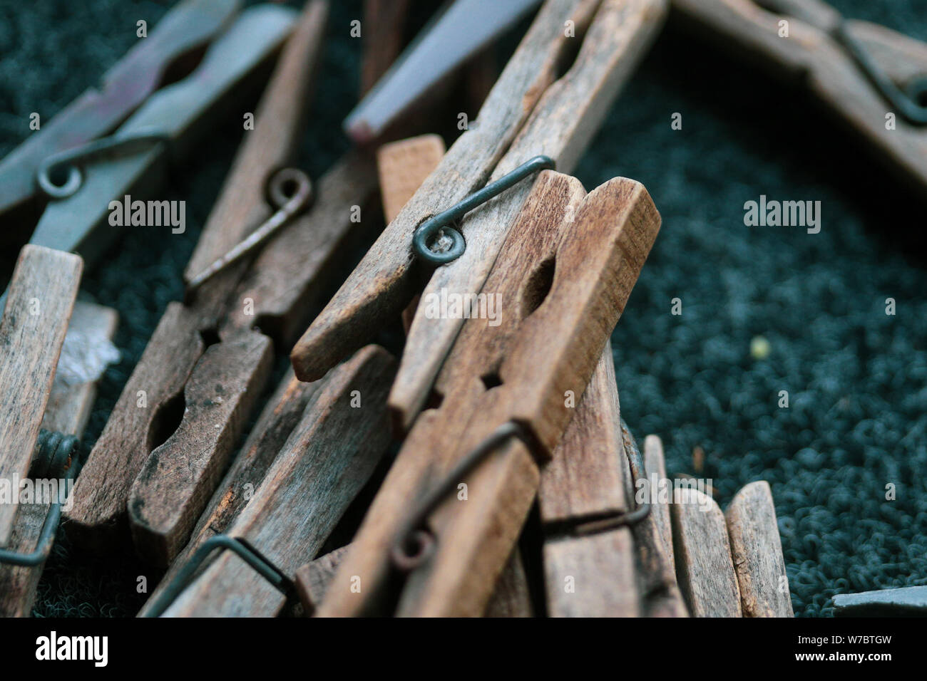 Details with a stack of plastic and wooden clothes pegs Stock Photo - Alamy