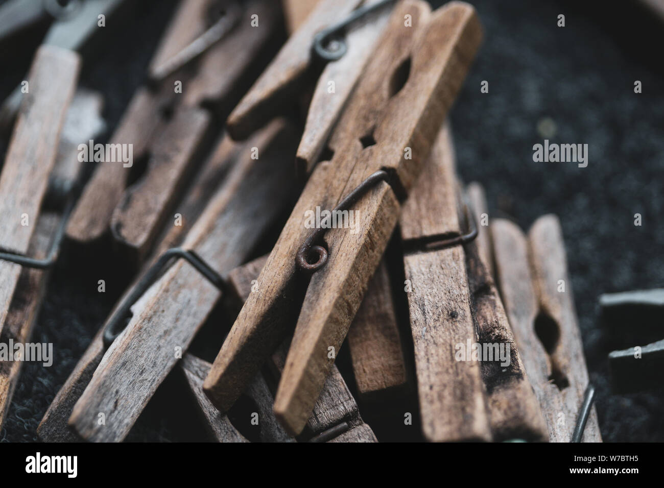 Details with a stack of plastic and wooden clothes pegs Stock Photo - Alamy