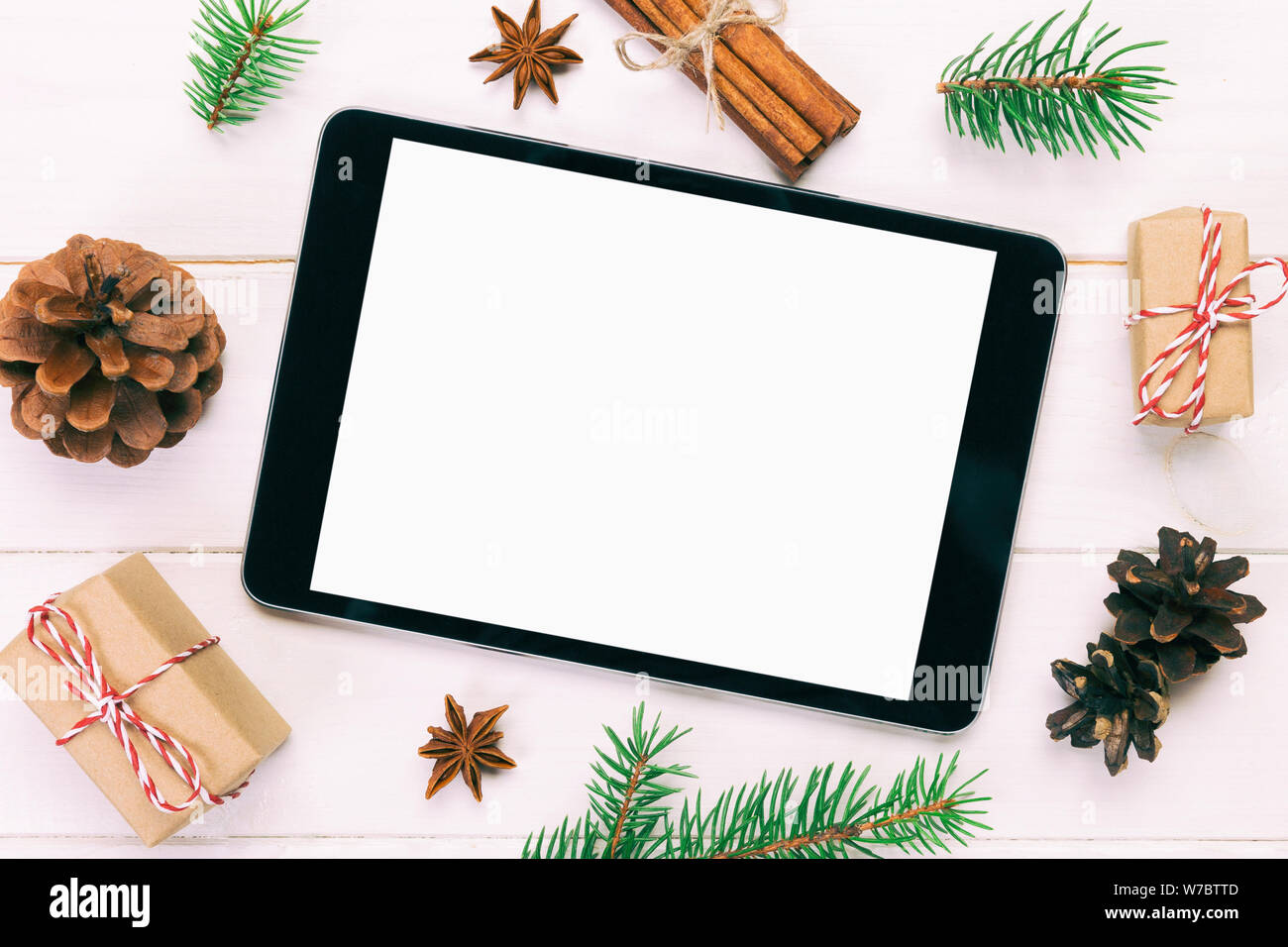Digital tablet mock up with rustic Christmas wooden background ...