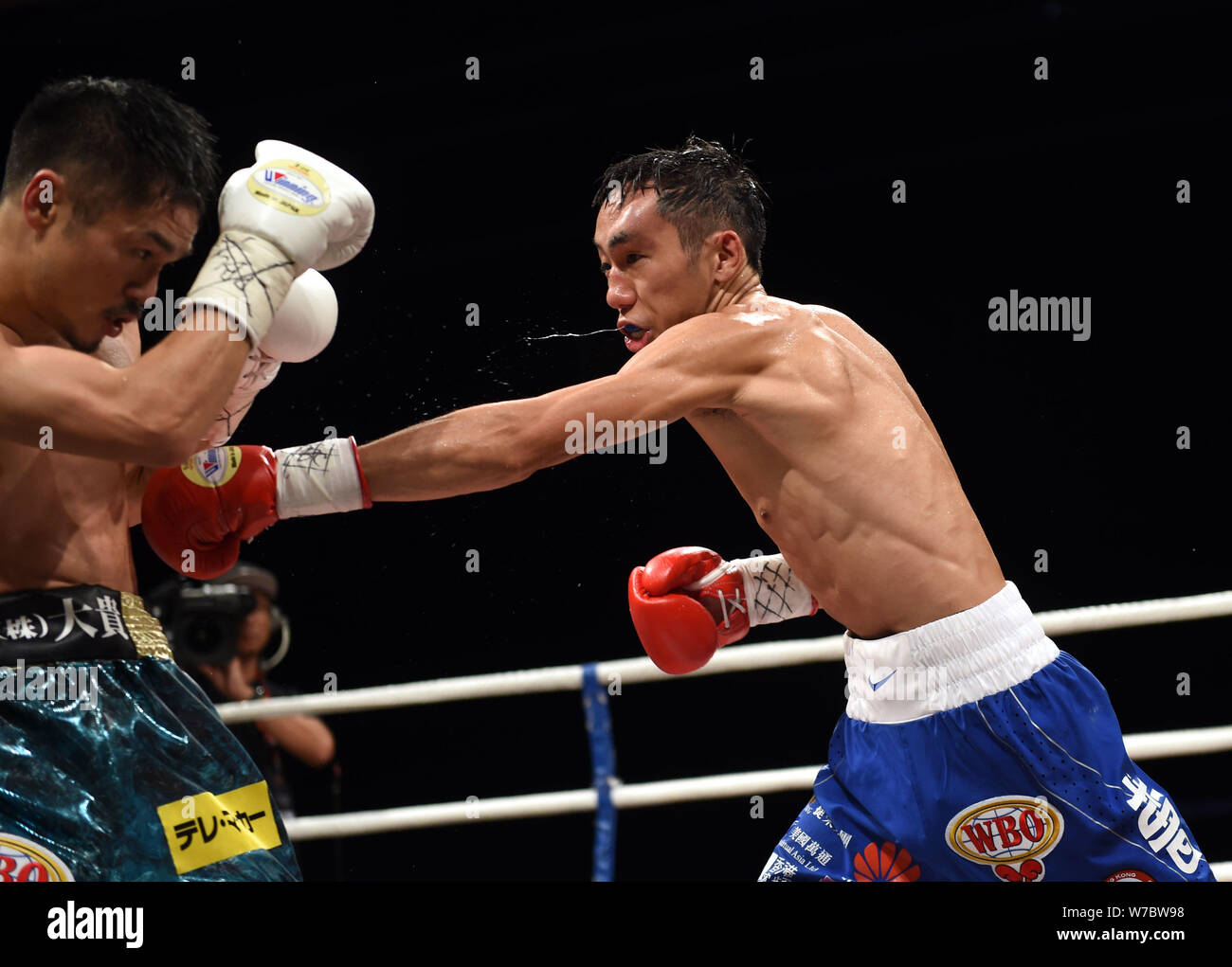 Rex Tso Sing-yu of Hong Kong, right, competes against Kohei Kono of ...