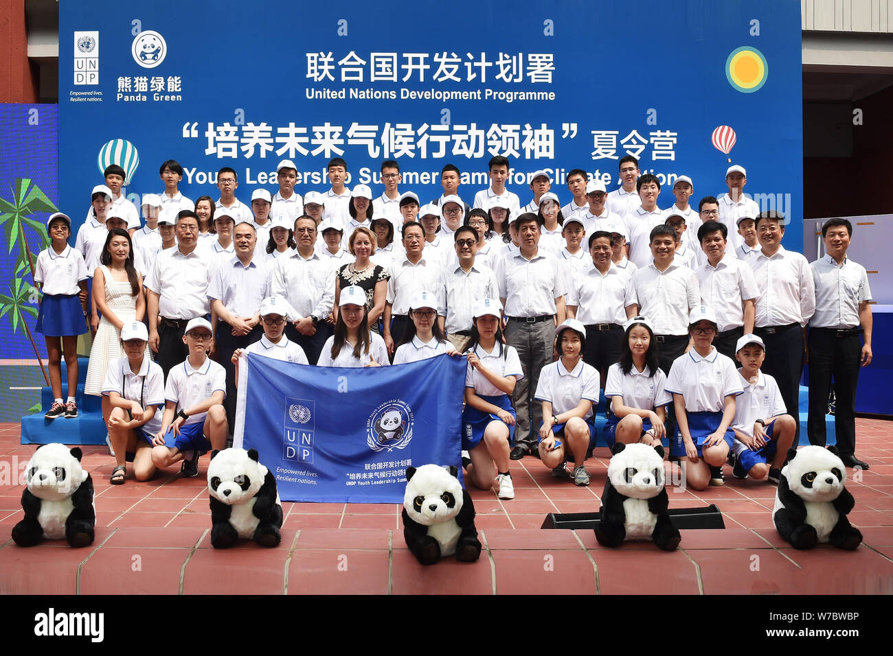 Young students attend the completion ceremony of the world's first ...