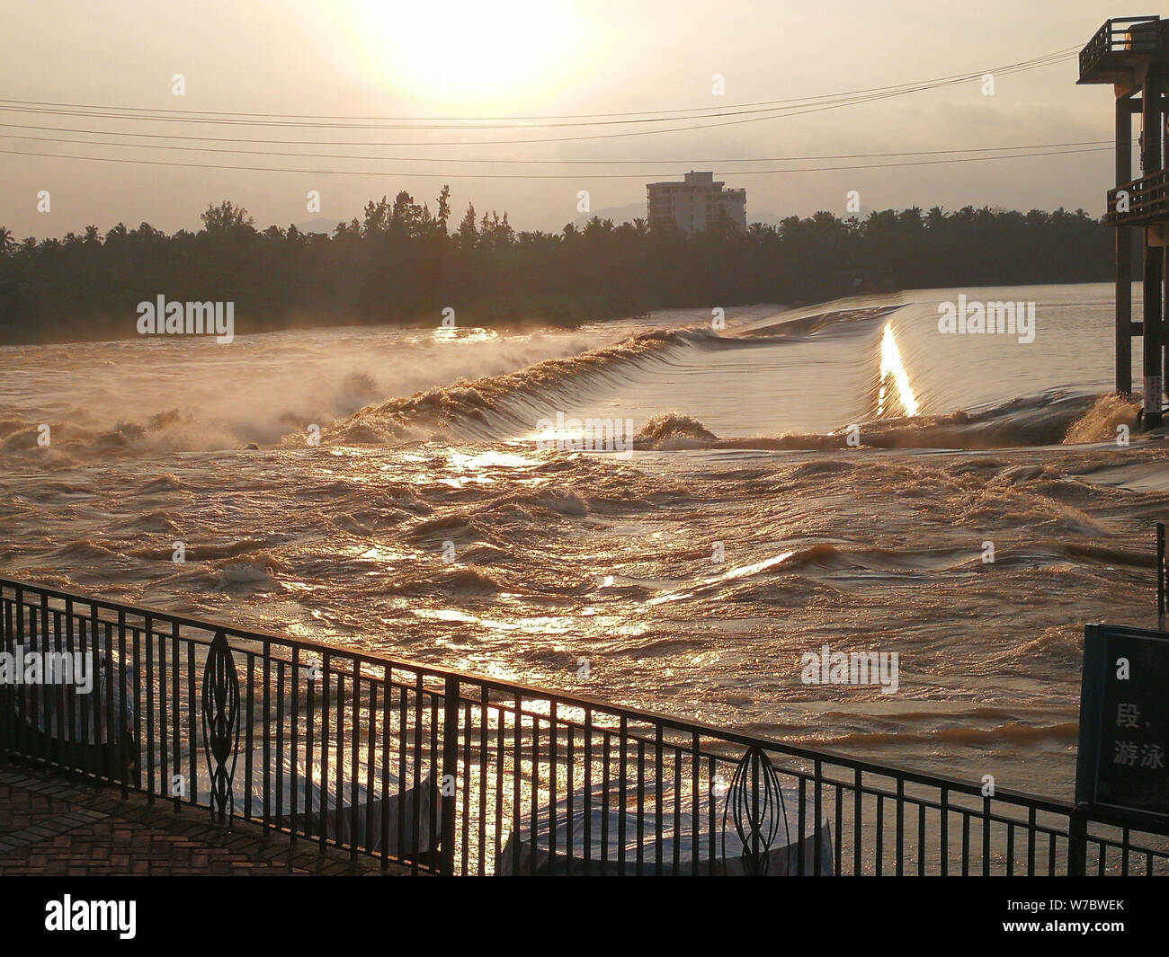 View of the cattle ridge road of hydropower station releasing water for ...
