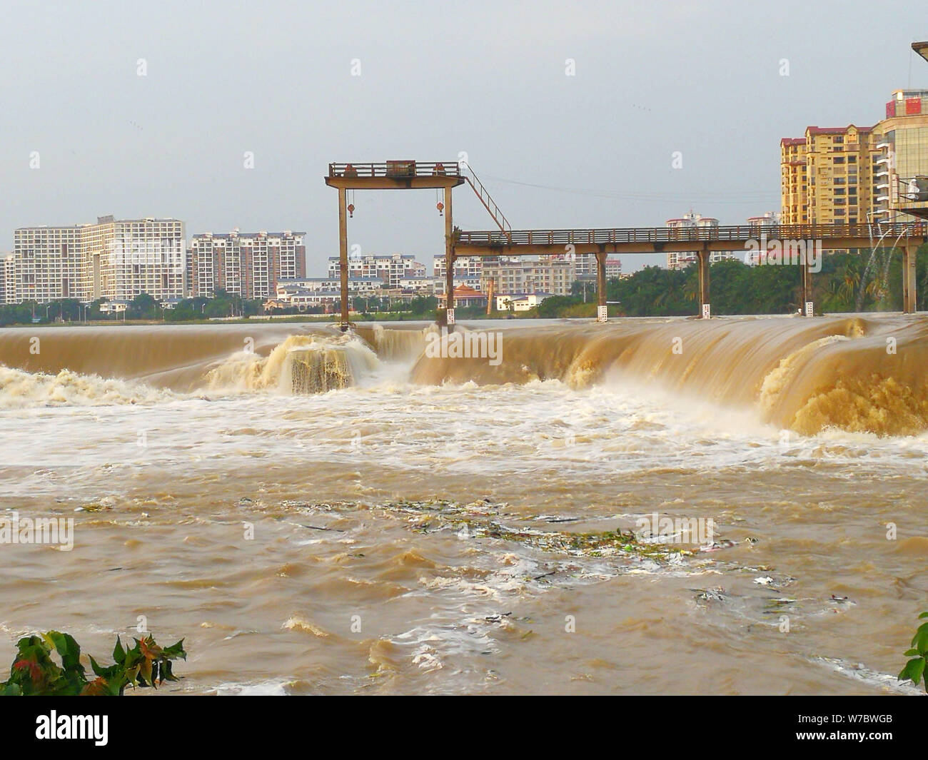 View of the cattle ridge road of hydropower station releasing water for ...