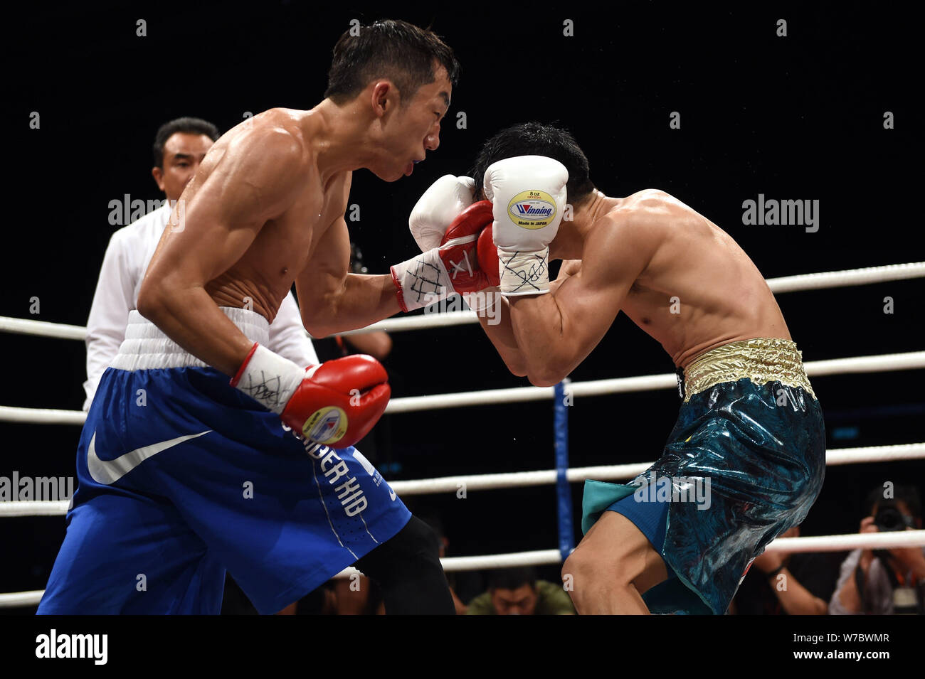 Rex Tso Sing-yu of Hong Kong, left, competes against Kohei Kono of ...