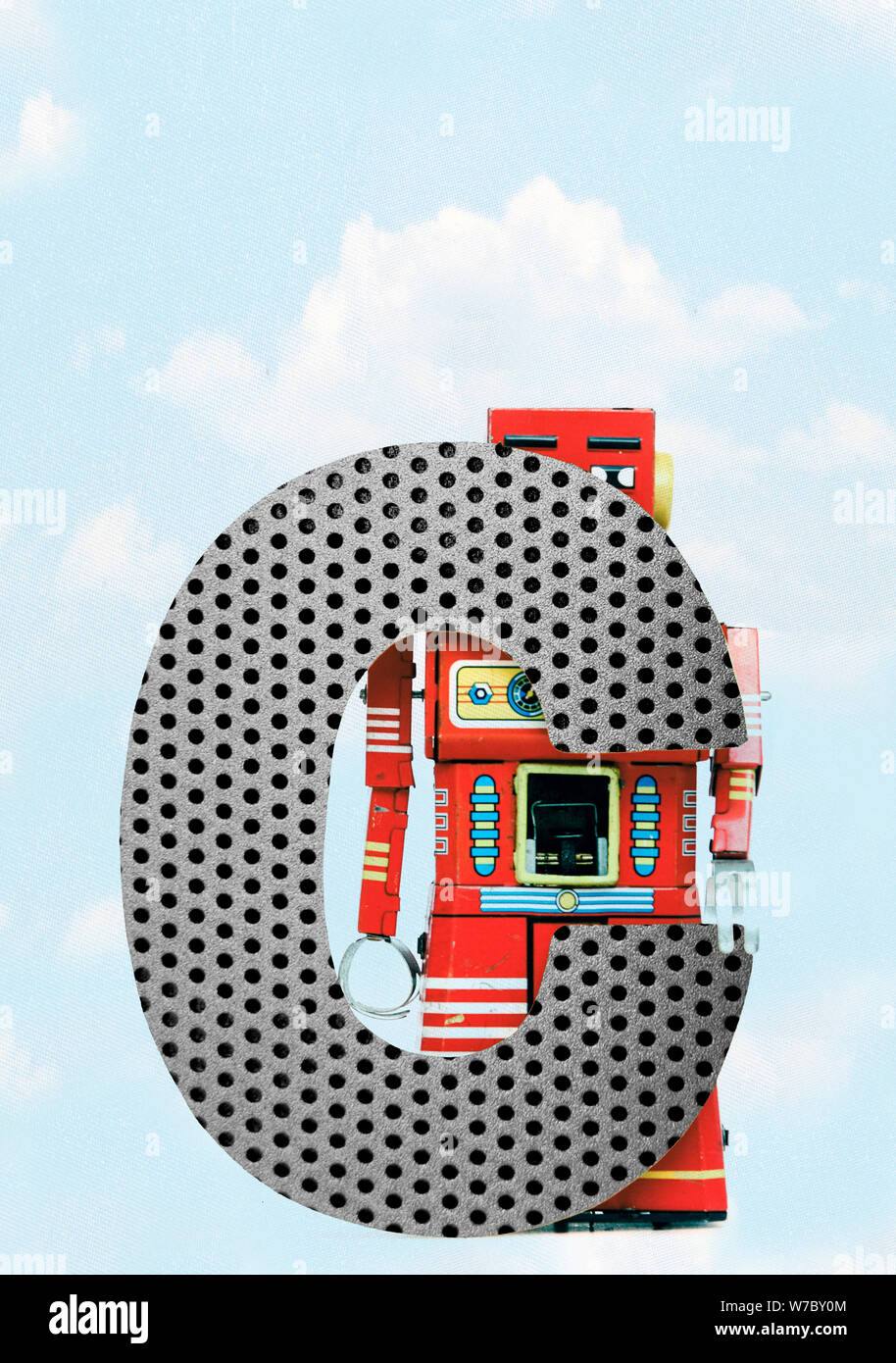 retro robots holding a big metal letter C with blue sky and clouds ...