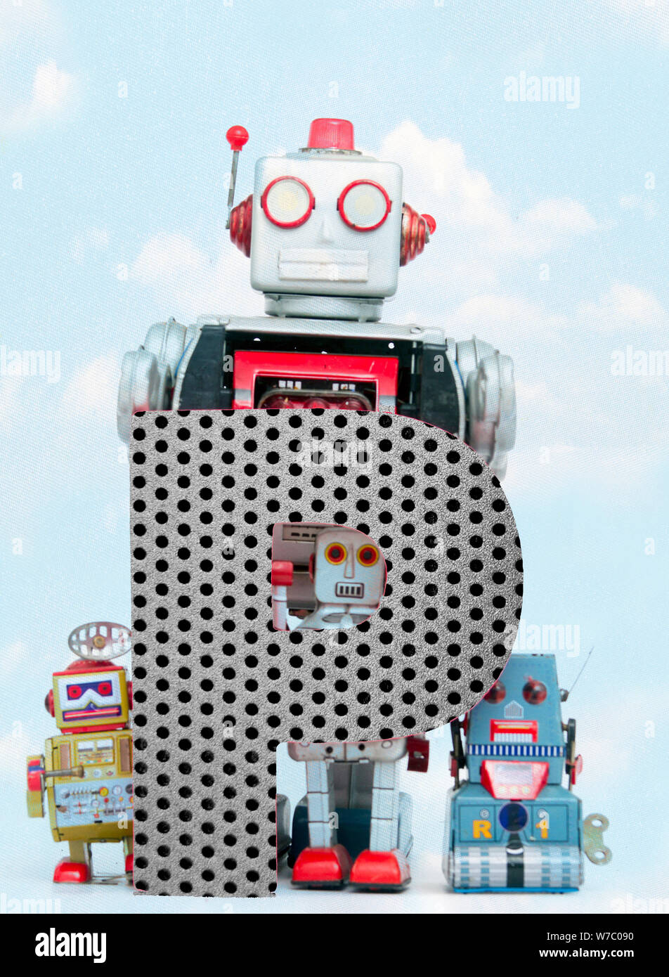 retro robots holding a big metal letter P with blue sky and clouds ...